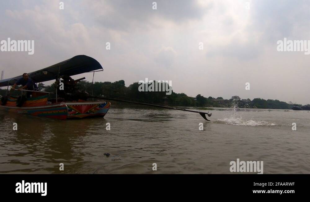 Slow motion spinning propeller and motor of the long tail boat (Taxi ...
