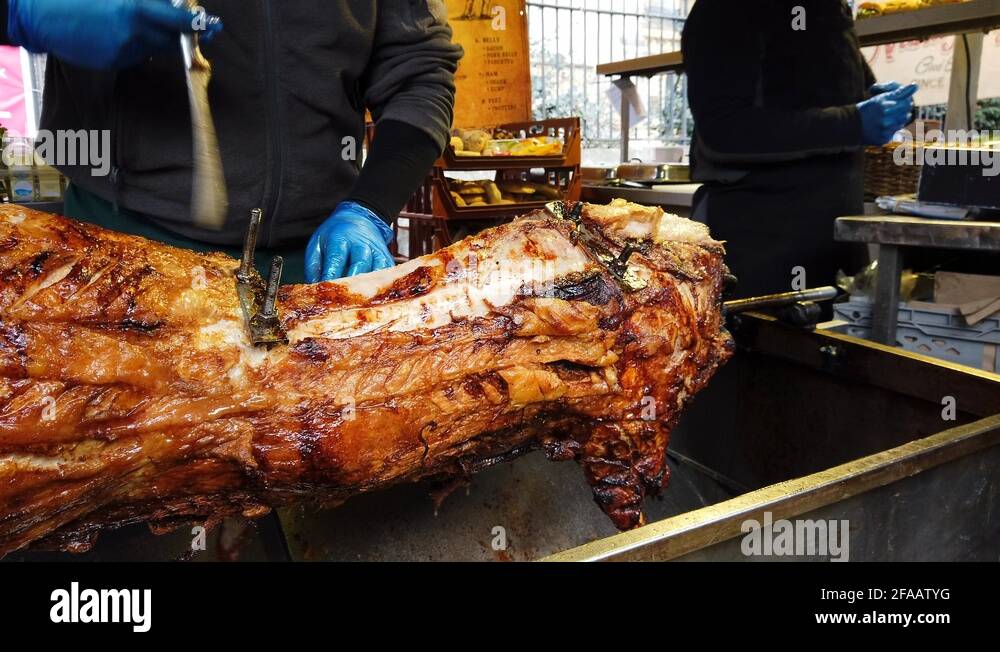 Spit roast pork Stock Videos & Footage - HD and 4K Video Clips - Alamy
