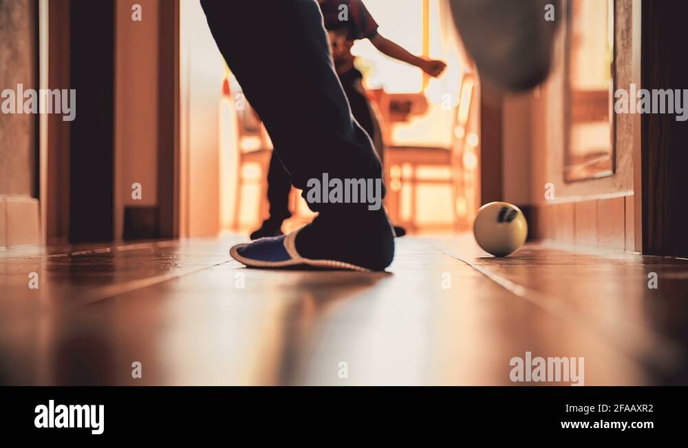 Kids playing soccer in hallway Stock Video Footage - Alamy