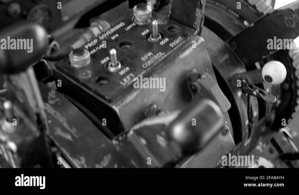 Detail of flight controls. Prop governing in cockpit of C-119 Flying ...