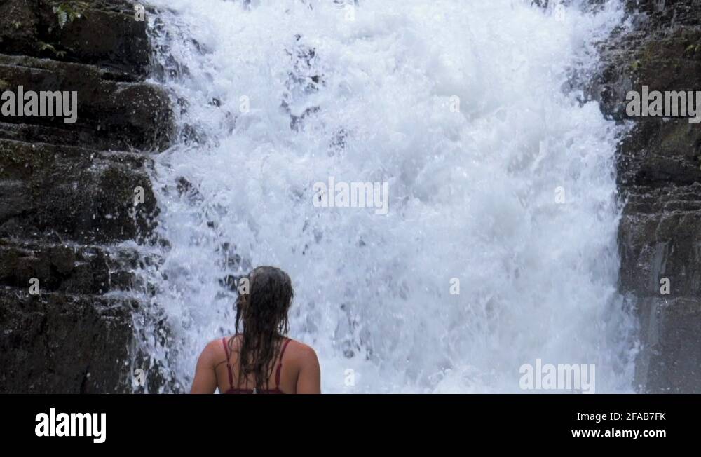 Slow Motion of Sexy Woman Bathing at the Bottom of Waterfall Stock ...
