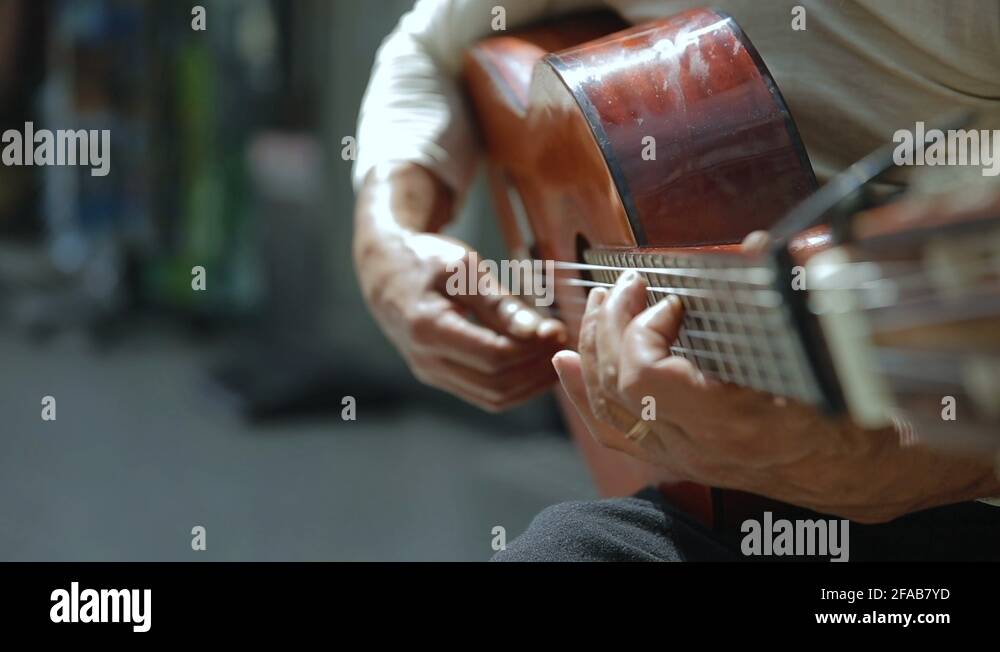 Busker playing acoustic guitar Stock Videos & Footage - HD and 4K Video ...