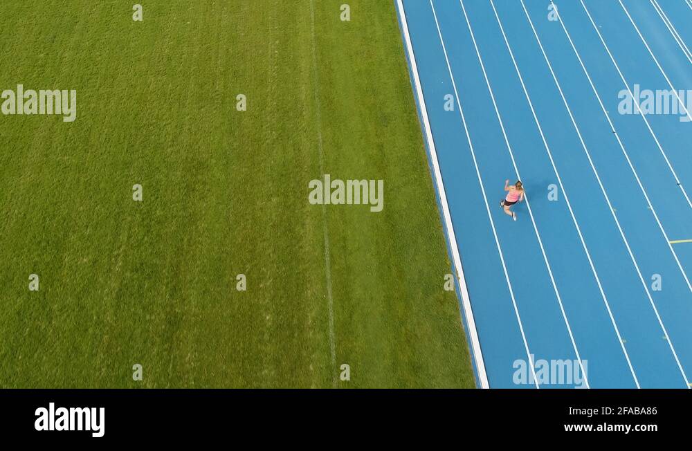 female sprinter in track and field Stock Video Footage - Alamy