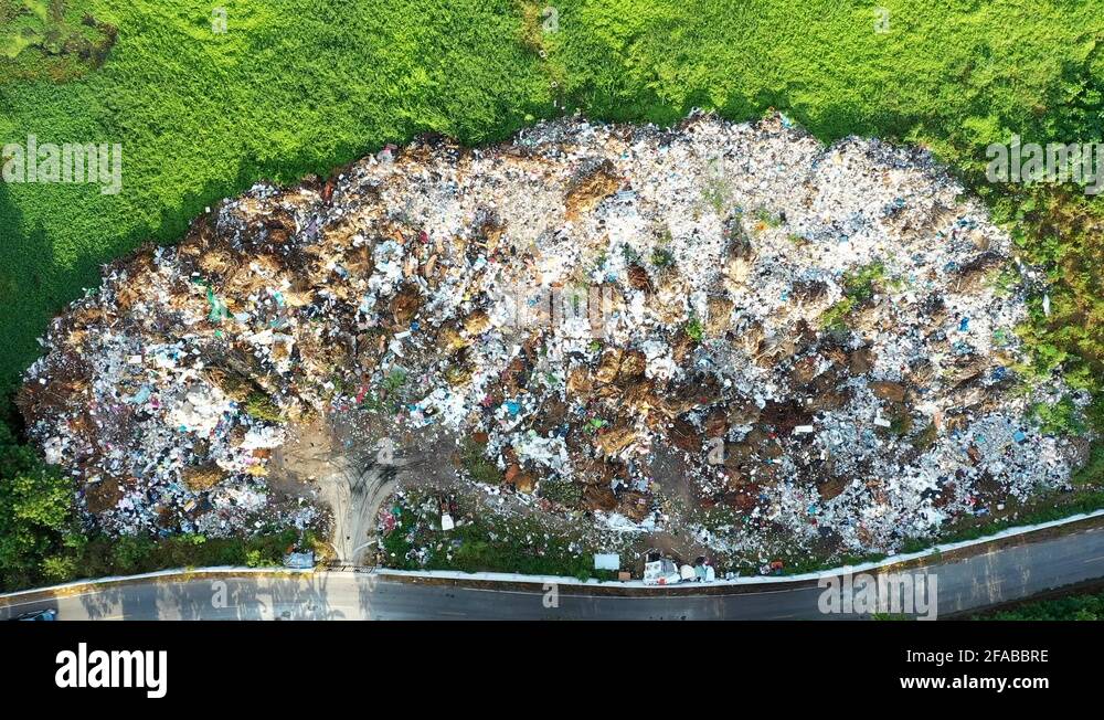 Aerial view and top view. Bulk waste disposal pond and waste from ...