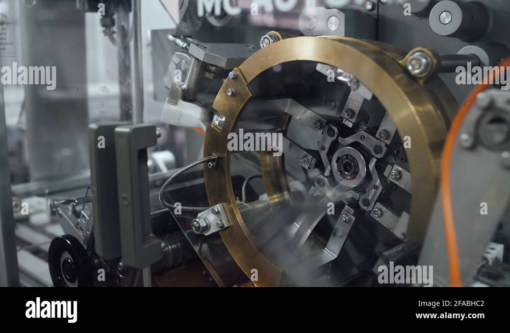 Chocolate factory, chocolate candies packaging process, view of factory ...