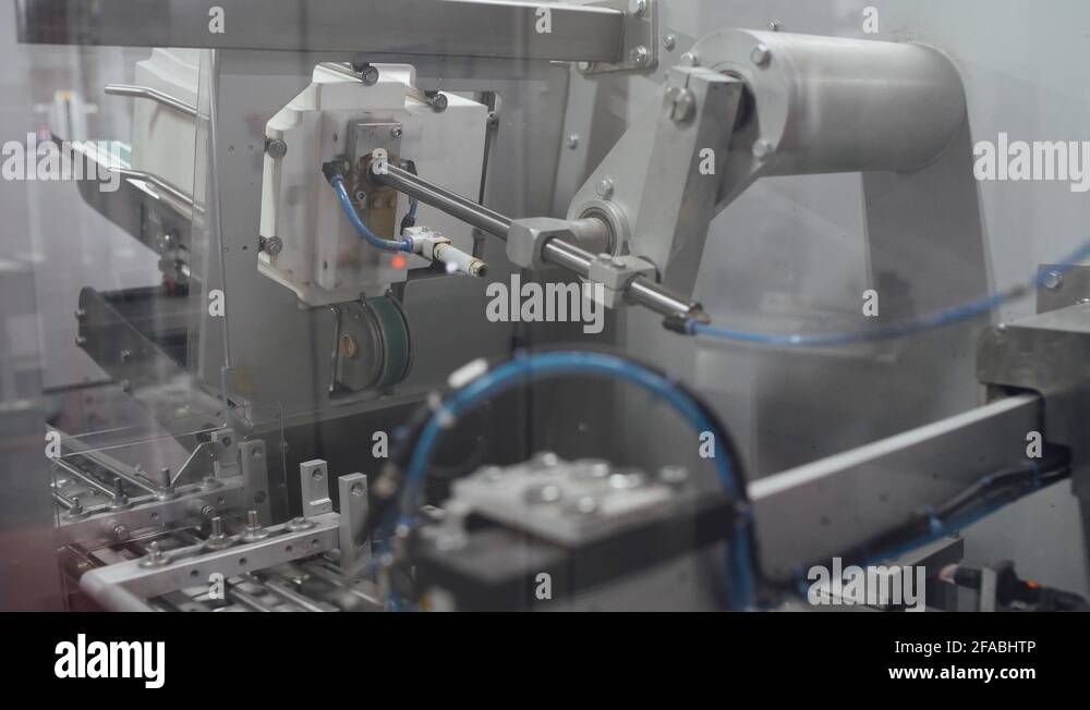 Chocolate factory, chocolate candies packaging process, view of factory ...