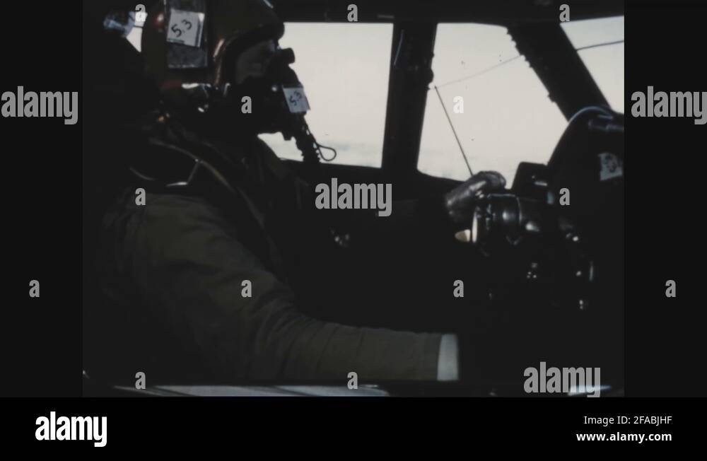 Pilot at the controls of B-52 Stratofortress while aircraft is in ...