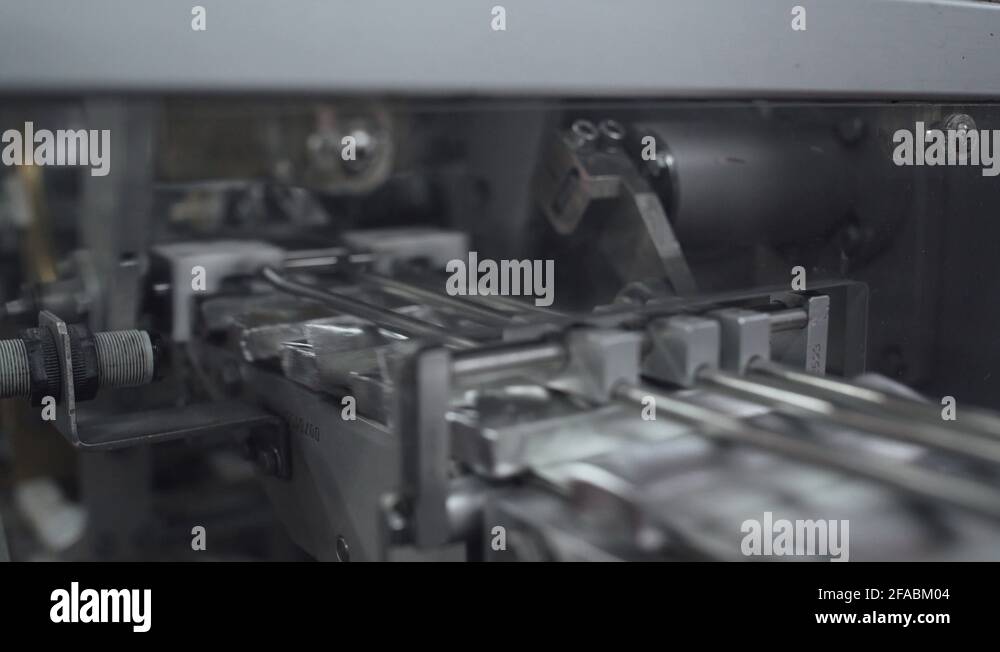 Chocolate factory, chocolate candies packaging process, view of factory ...