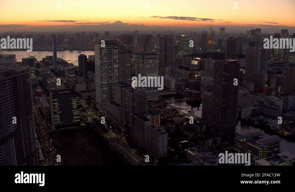 Tokyo, Japan circa-2018. Flying over Tokyo at dusk. Shot from ...