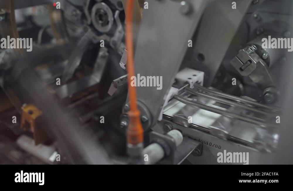 Chocolate factory, chocolate candies packaging process, view of factory ...