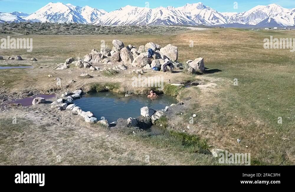 Soaking in a natural hot spring pool Stock Videos & Footage - HD and 4K ...
