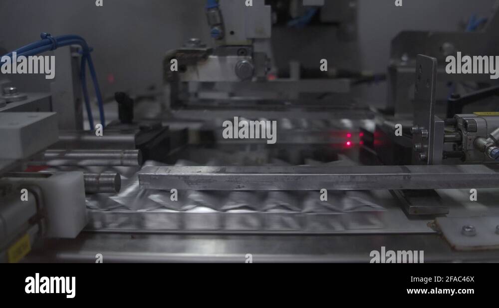 Chocolate factory, chocolate candies packaging process, view of factory ...