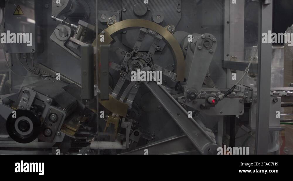 Chocolate factory, chocolate candies packaging process, view of factory ...