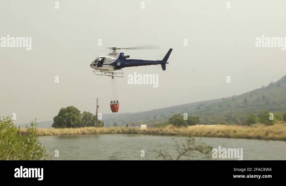 Helicopter bucket Stock Videos & Footage - HD and 4K Video Clips - Alamy