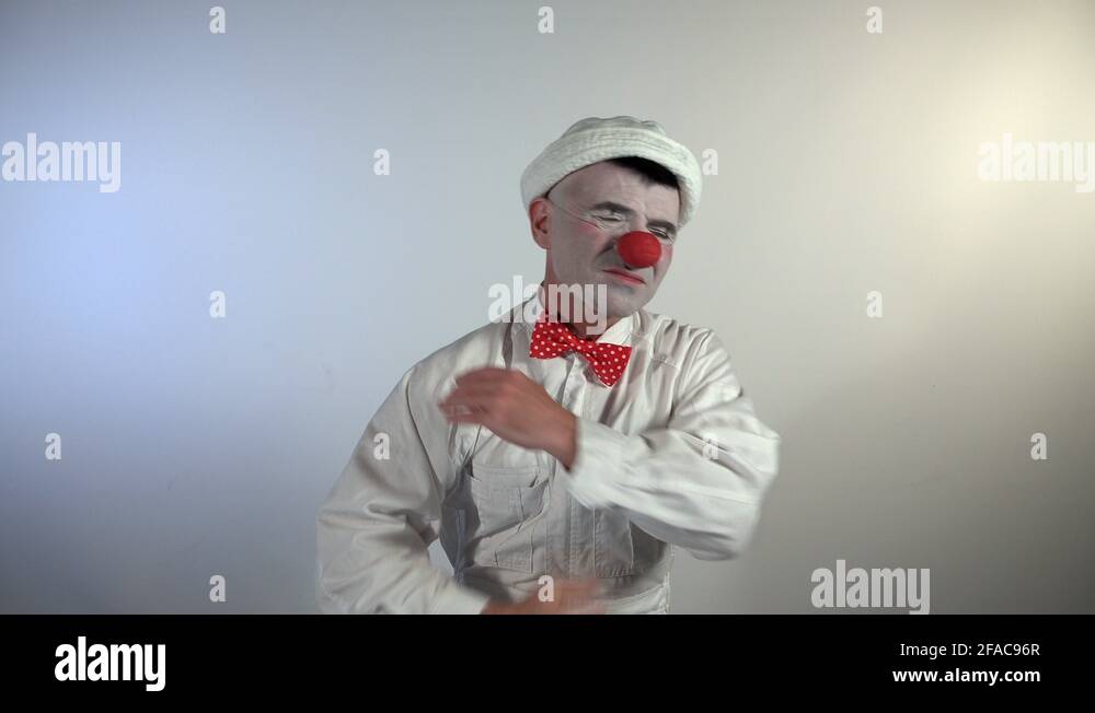 Emoji Clown. A clown with a shoulder pain and muscle contractions is ...