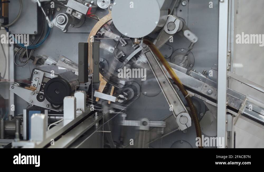 Chocolate factory, chocolate candies packaging process, view of factory ...