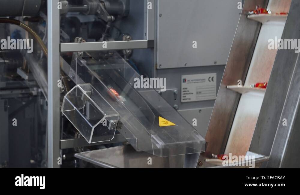 Chocolate factory, chocolate candies packaging process, view of factory ...