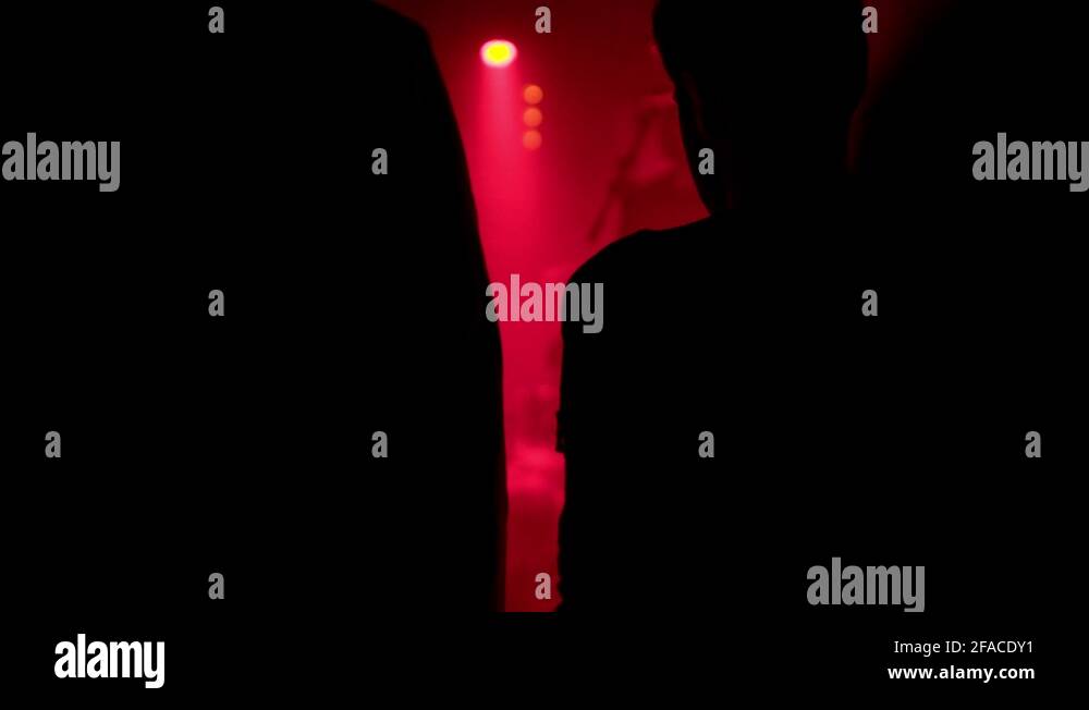 Live concert with red stage lights in the background Stock Video ...