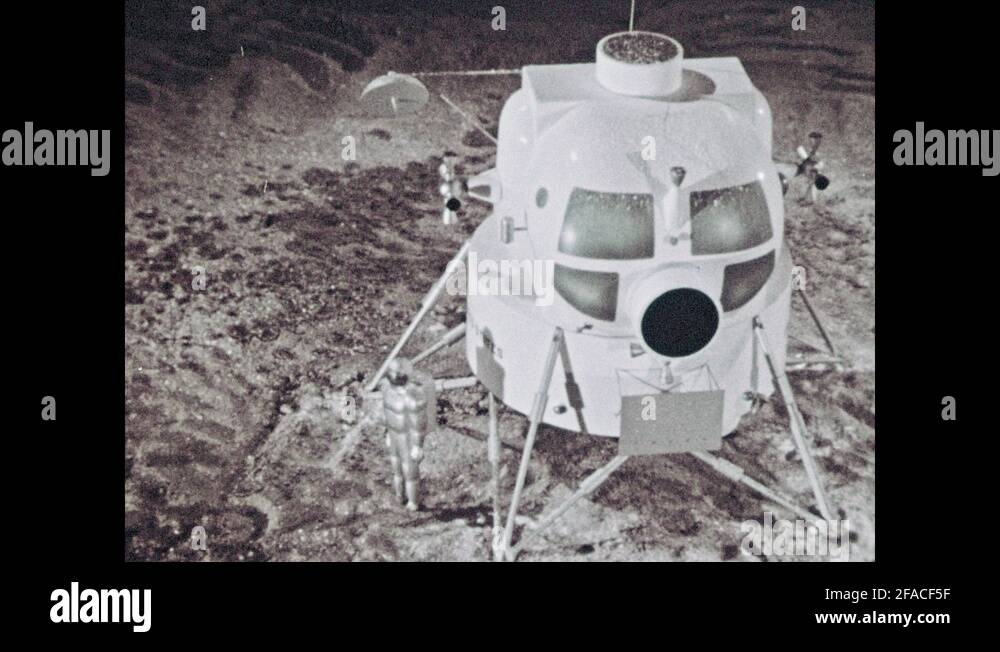 1960s: Model of lunar lander and astronaut on surface of moon Stock ...
