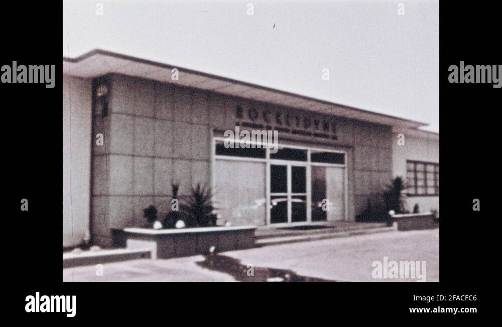 1960s: Entrance to building. Rocket testing site. Model of astronaut ...