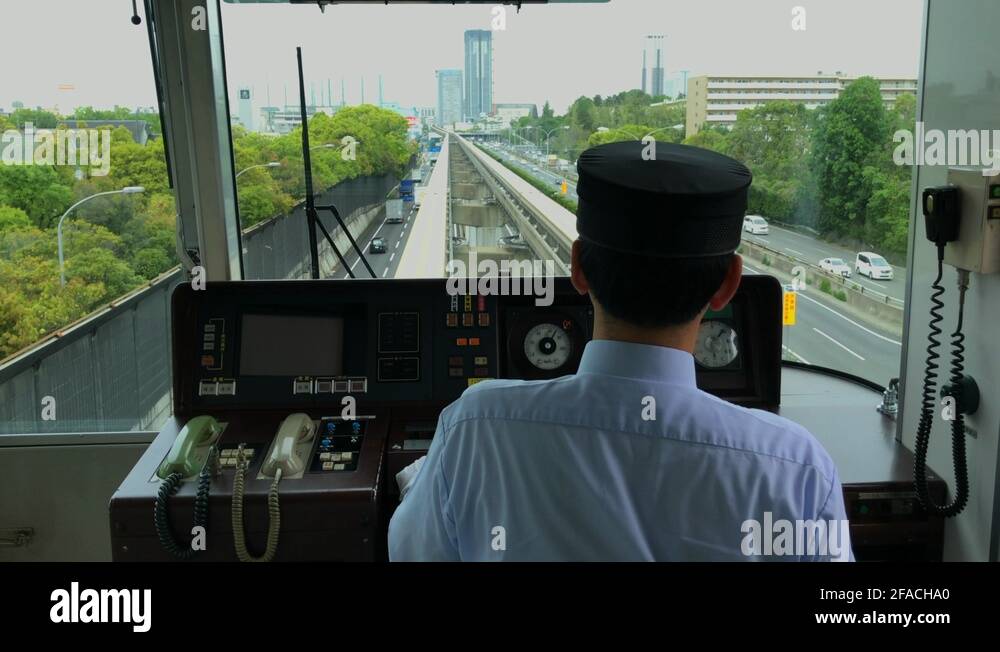 Japanese monorail conductor in Osaka, Japan Stock Video Footage - Alamy