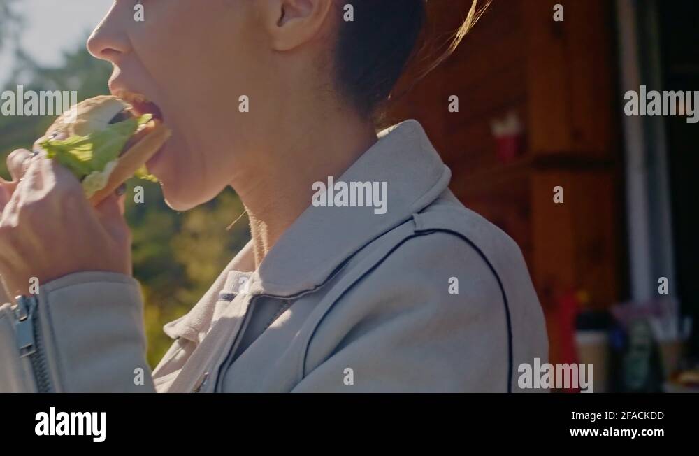 Biting bread woman Stock Videos & Footage - HD and 4K Video Clips - Alamy