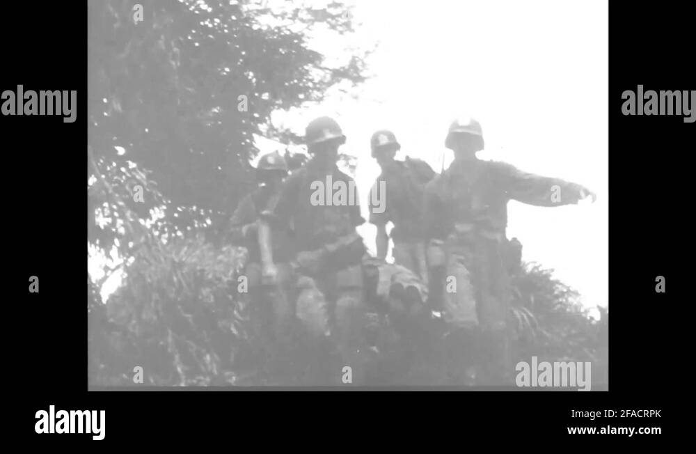 Soldier carry death bodies and injured soldier in attack - 1943 Stock ...