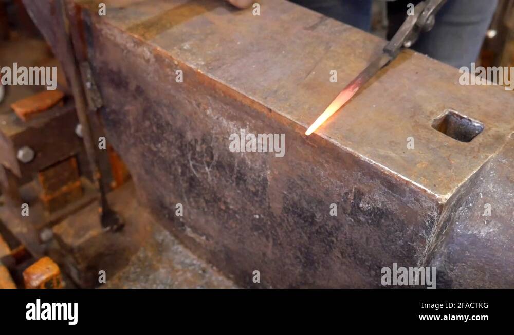Forging a Rat's Tail in Metal Stock at the Blacksmith Anvil Stock Video ...