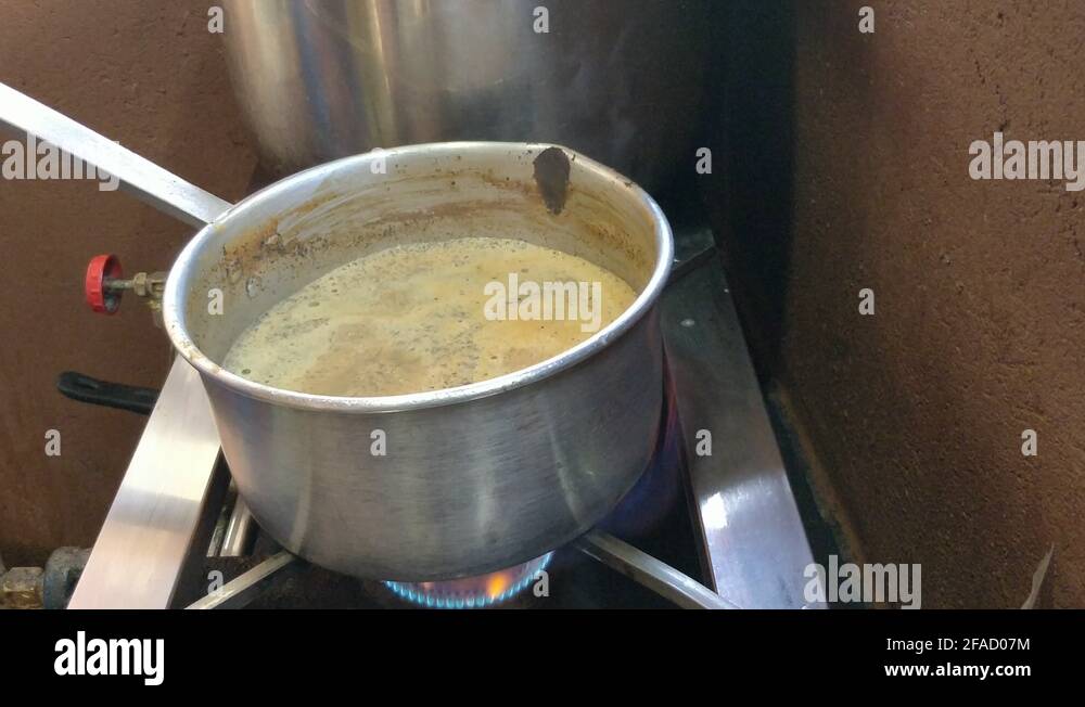 Boiling milk tea Stock Videos & Footage - HD and 4K Video Clips - Alamy