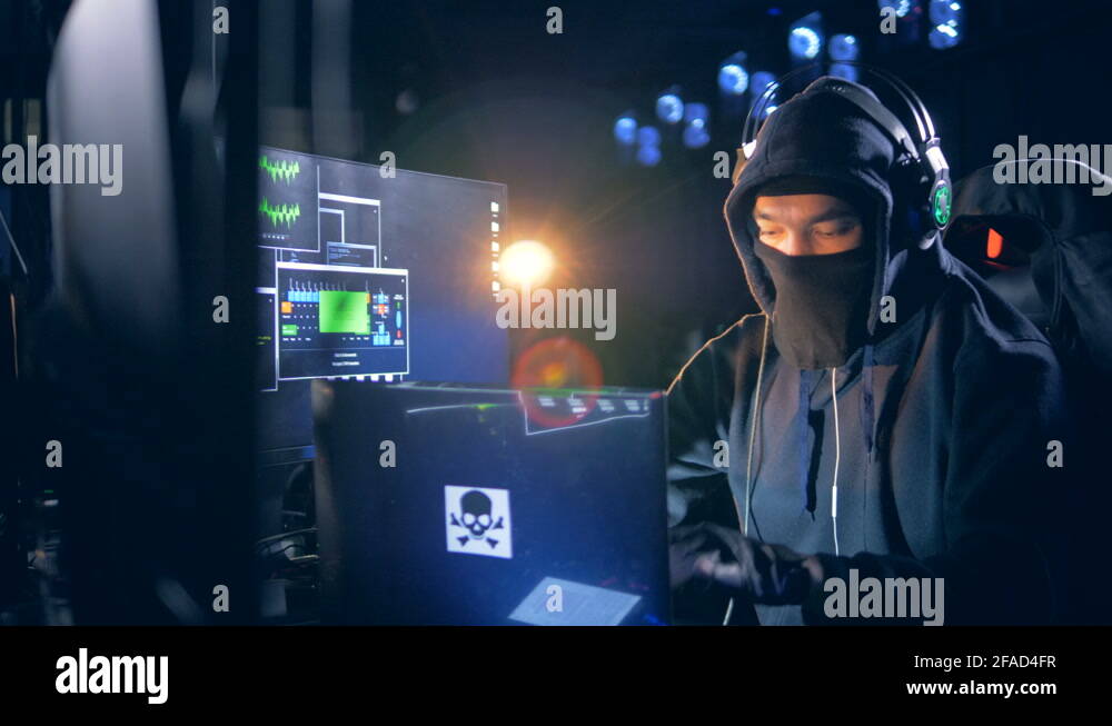 Hacking process of a male hacker in a hideout place Stock Video Footage ...