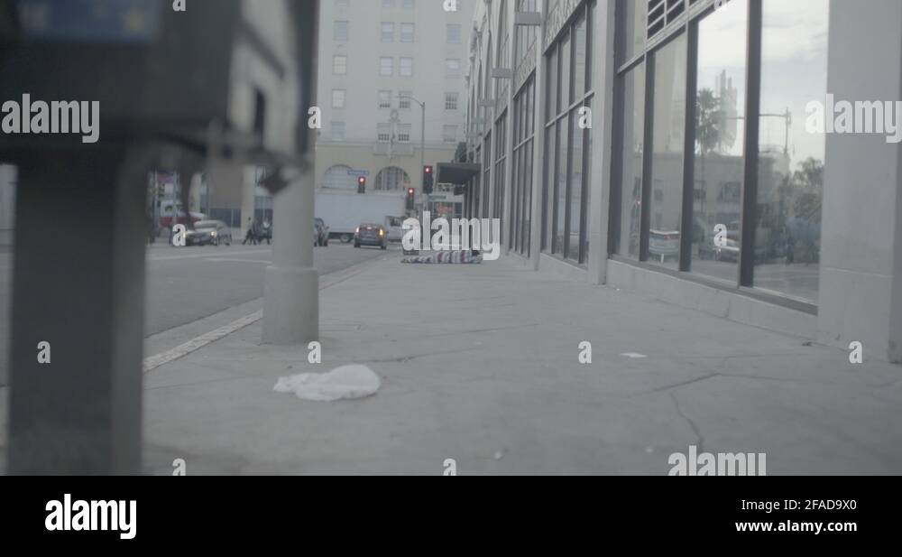 Homeless sleeping on sidewalk in Stock Videos & Footage - HD and 4K ...