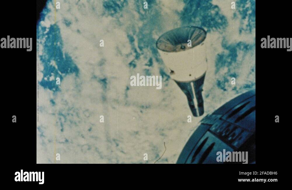 1960s: Gemini command module floats in Earth's orbit Stock Video ...