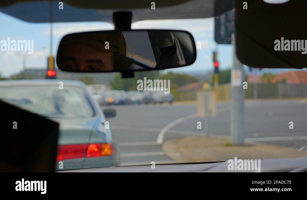 Traffic and traffic lights from inside a car in Australia Stock Video ...