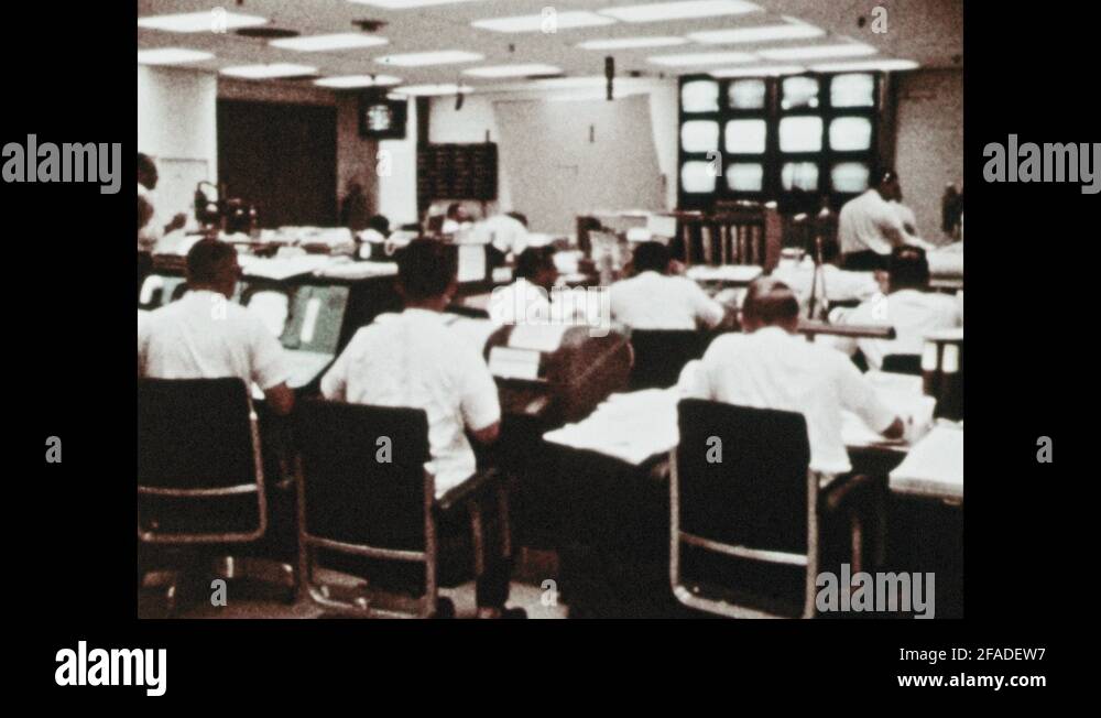 1960s: Room of space engineers at their control room computers ...