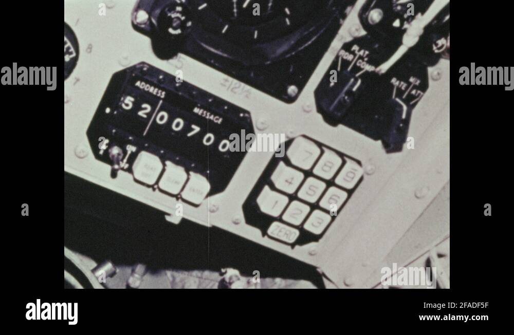 1960s: Control panel in cockpit of spacecraft. Spacecraft in orbit ...