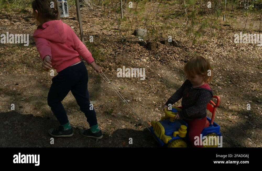 Kids playing outside in spring Stock Videos & Footage - HD and 4K Video ...