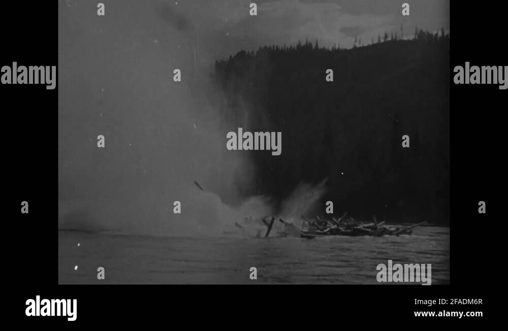 Wooden log falling in middle of river - 1930 Stock Video Footage - Alamy