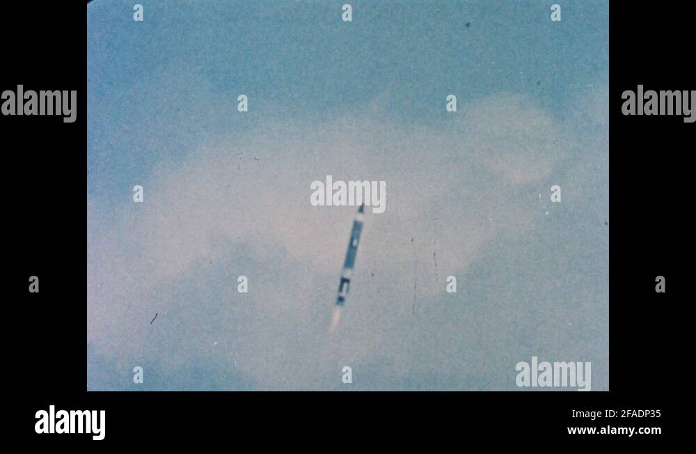 1960s: Rocket flying into sky. Stage separates from rocket as it ...