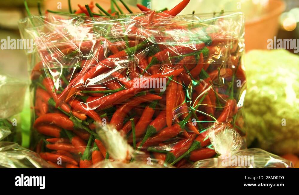 Red chilli peppers Stock Videos & Footage - HD and 4K Video Clips - Alamy