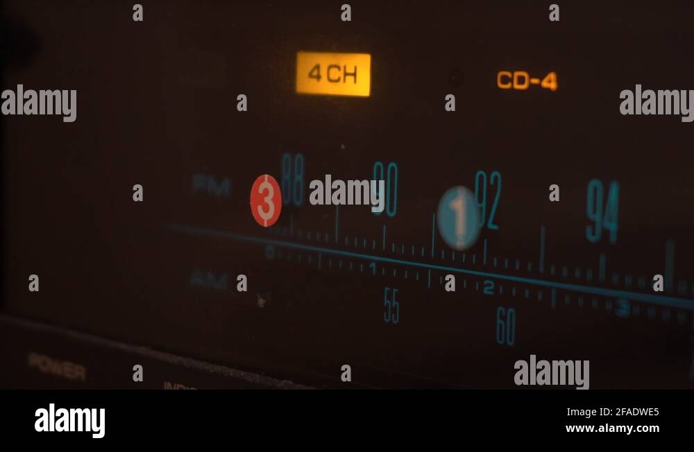 Pushing buttons and twisting knobs on an old amplifier Stock Video ...