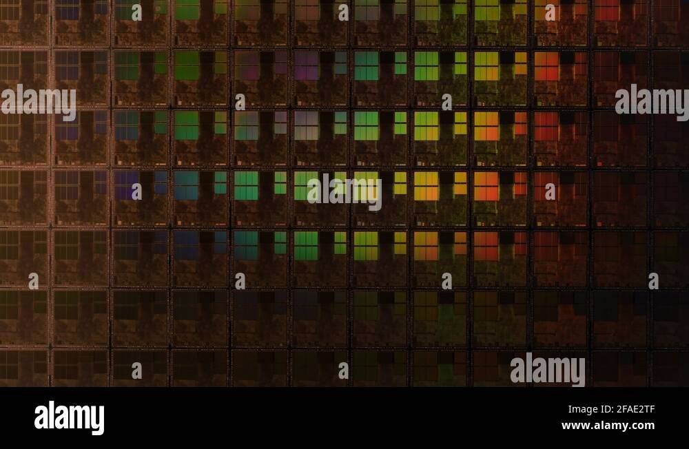 Scanning light ray across a silicon wafer with computer chips Stock ...