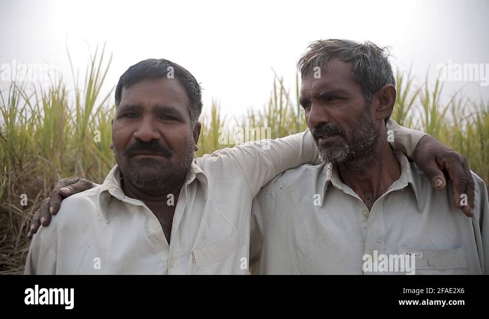 Two friends share a special moment in a punjab Village, Pakistan Stock ...