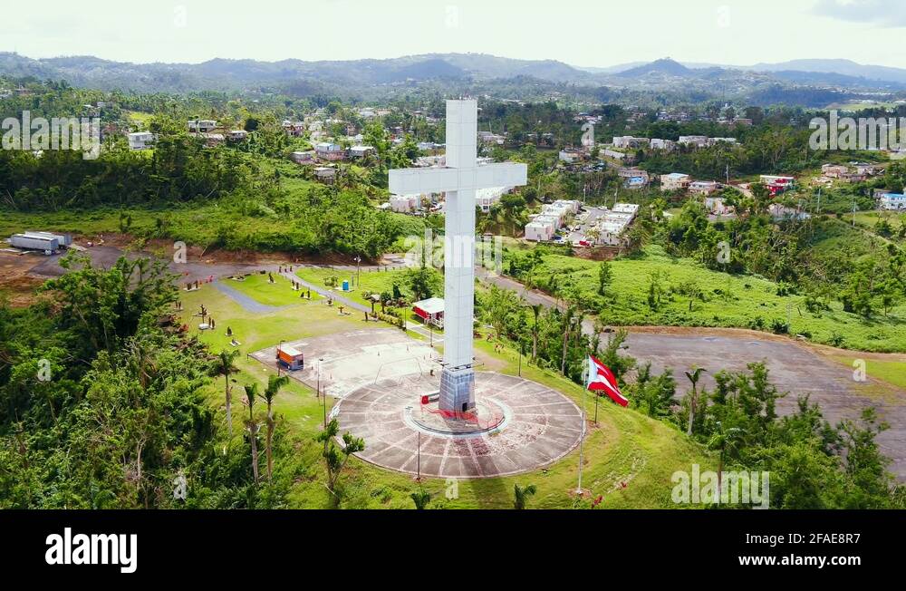 Big Cross with a Puerto Rican flag in front overlooking Bayamon Stock ...