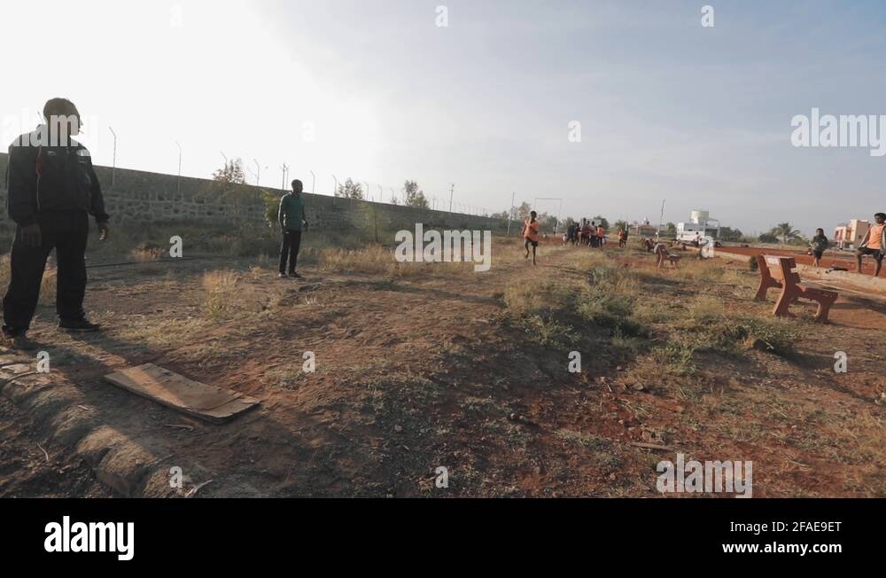 Local Indian child doing long jump Stock Video Footage - Alamy