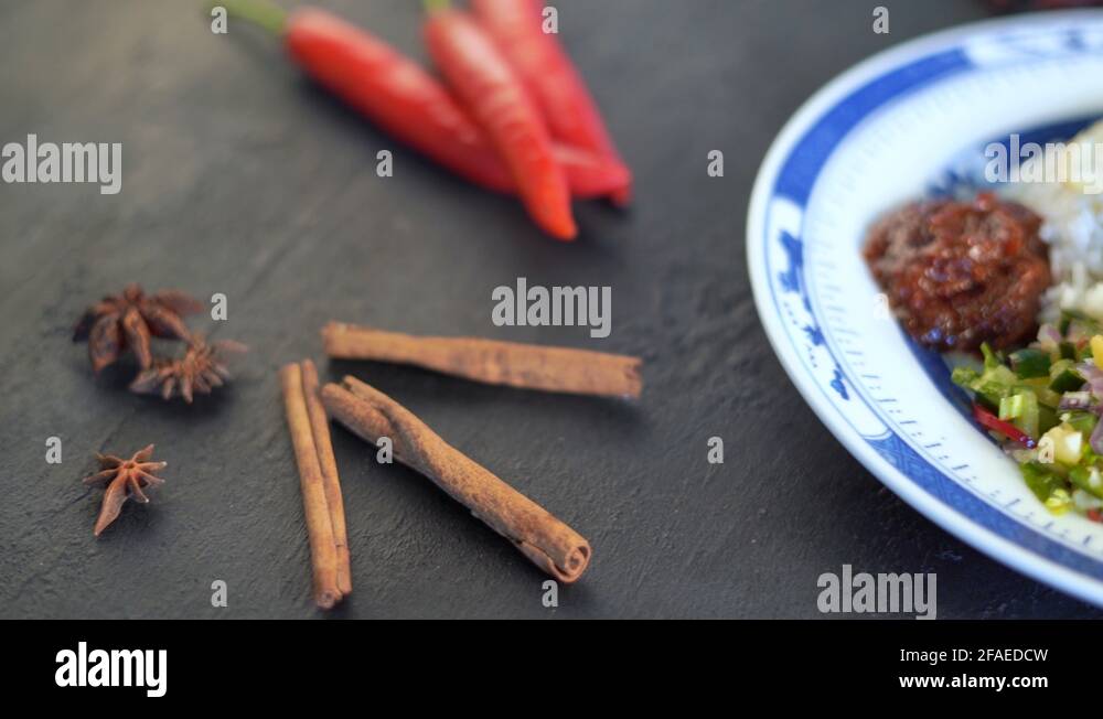 asian style fried fish fillet rice with sambal and salsa acar Stock ...