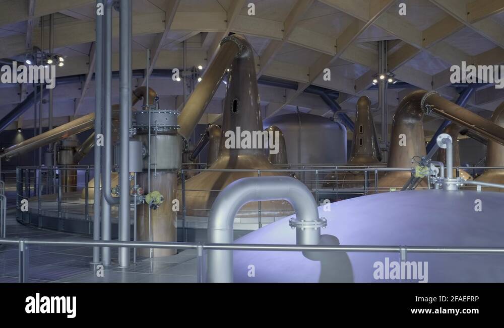 Interior pipework, copper stills and mash tuns highlighting the Stock ...
