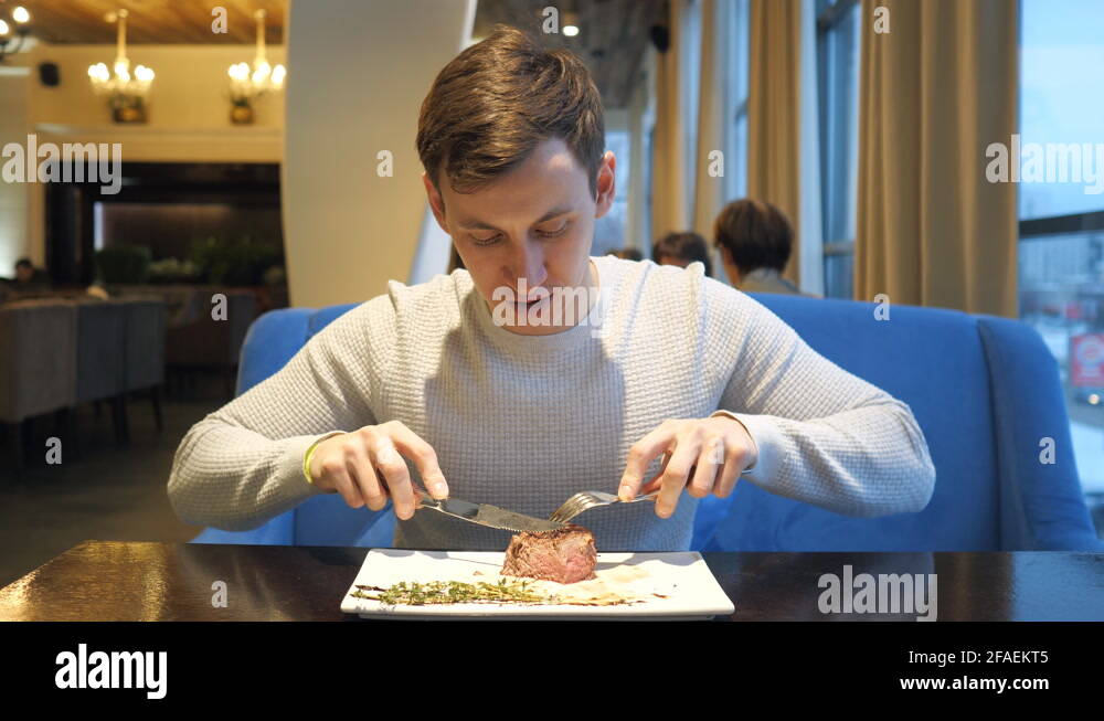 Handsome man eating fork knife Stock Videos & Footage - HD and 4K Video ...