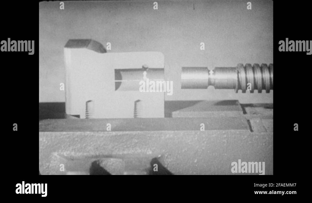 1940s: Cross section of clamp shows shaft and moveable jaw. Arrows ...