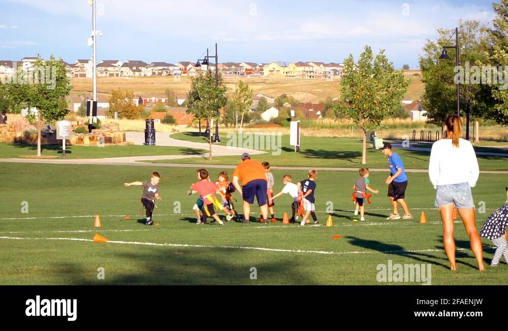 Kids playing flag football Stock Videos & Footage - HD and 4K Video ...