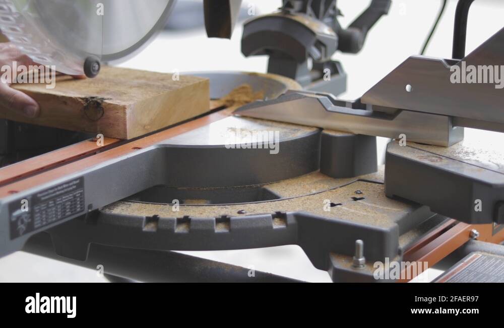 Cutting a block of cedar on a 12 inch, dual bevel, sliding miter saw on ...